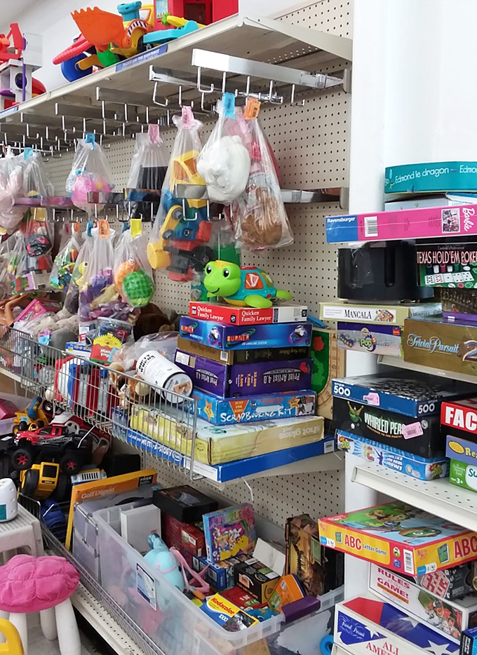 The toy section: where board games with all their pieces (a miracle!) sit alongside bagged treasures waiting for their second chance at playtime.
