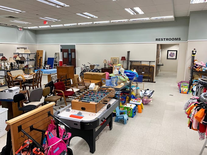 The toy and game section: where foosball tables and educational materials coexist in beautiful harmony. Childhood joy, now at clearance prices!