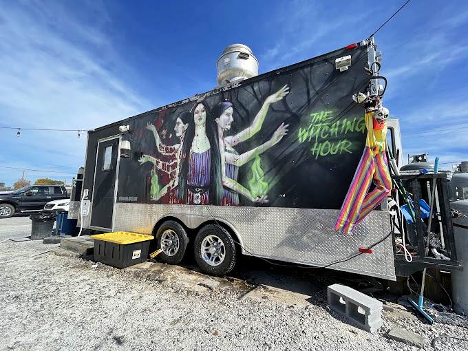 The truck's side mural transforms functional transport into mobile art &ndash; a multi-armed siren of spooky deliciousness beckoning hungry passersby.