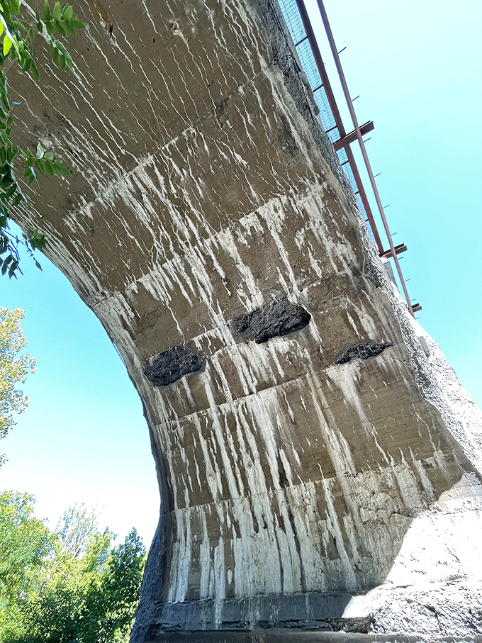 Look up from directly underneath and you'll spot what some claim are "tears" seeping through concrete&mdash;engineering explanation or ghostly manifestation? You decide.