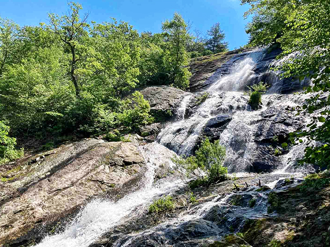 Water cascading over ancient rock faces creates nature's own multi-tiered fountain display&mdash;no electricity or maintenance required, just gravity doing what it does best.
