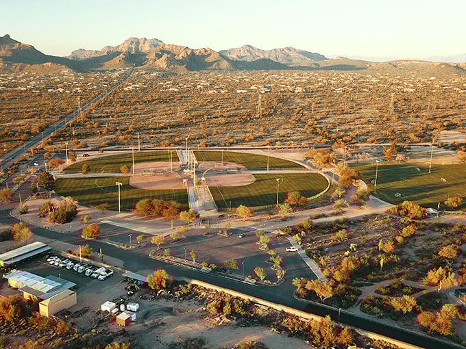 The rugged Superstition Mountains loom over Apache Junction, where affordable living meets legendary desert landscapes.