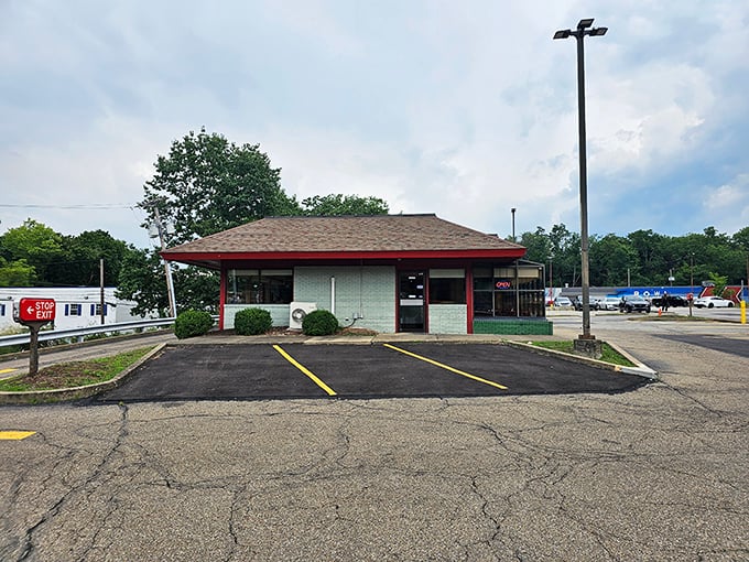 Brighton Hot Dog Shoppe's bright red building stands like a beacon for hungry travelers. Some landmarks guide ships; this one guides appetites! 