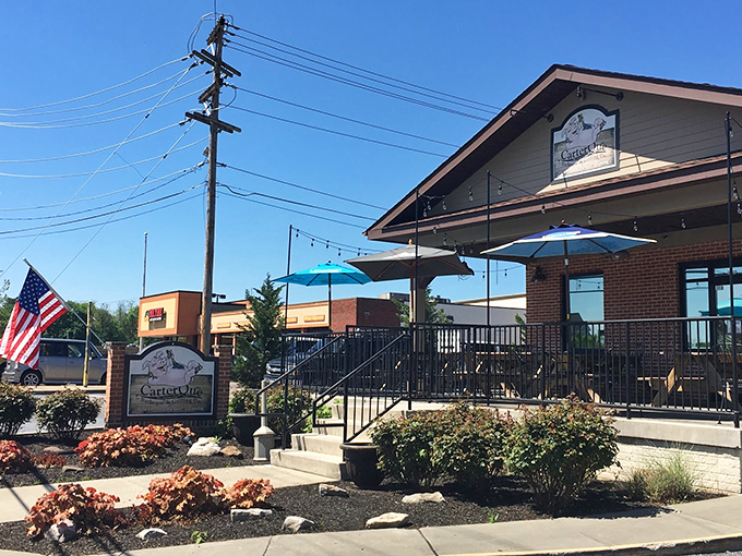 CarterQue's cheerful exterior welcomes barbecue enthusiasts like an old friend. That pig on the sign knows exactly what you're in for.