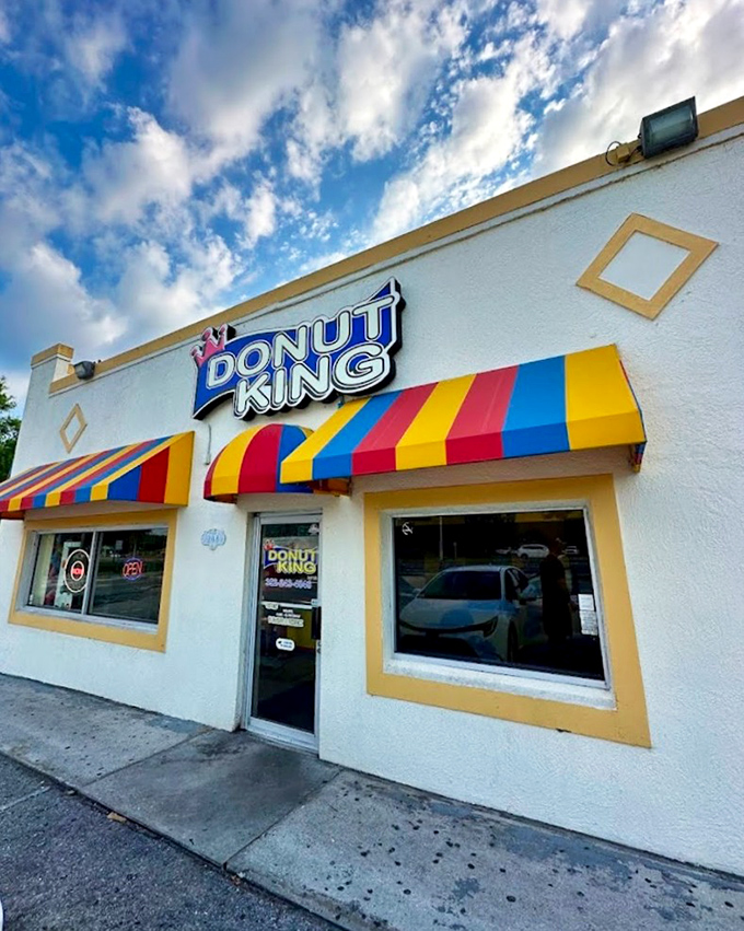 Donut King's carnival-colored awnings hint at the fun inside. This is where donut dreams come true.