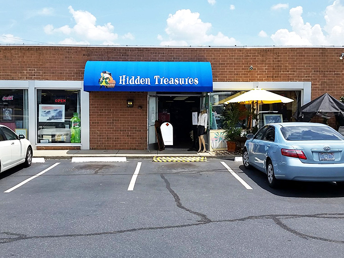 Hidden Treasures lives up to its name with that bright blue awning. Like finding an oasis in a retail desert!