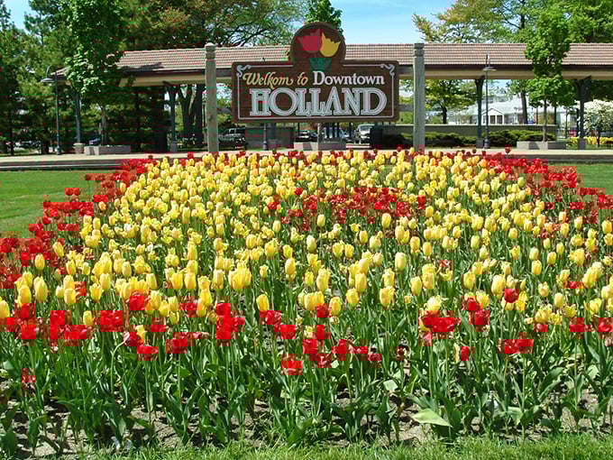 Holland's welcome sign blooms with the town's famous tulips. A Dutch-inspired paradise where flowers, not traffic, stop you in your tracks.