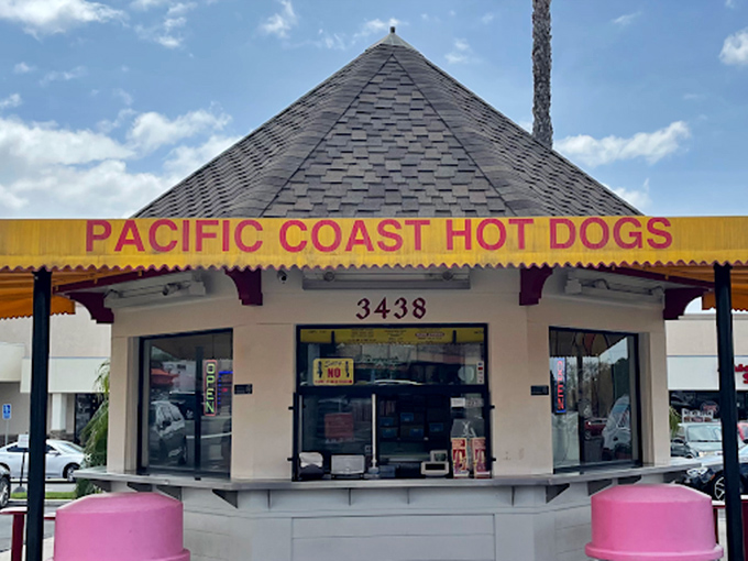 Pacific Coast Hot Dogs' hexagonal hut stands like a hot dog lighthouse, guiding the hungry safely to shore.