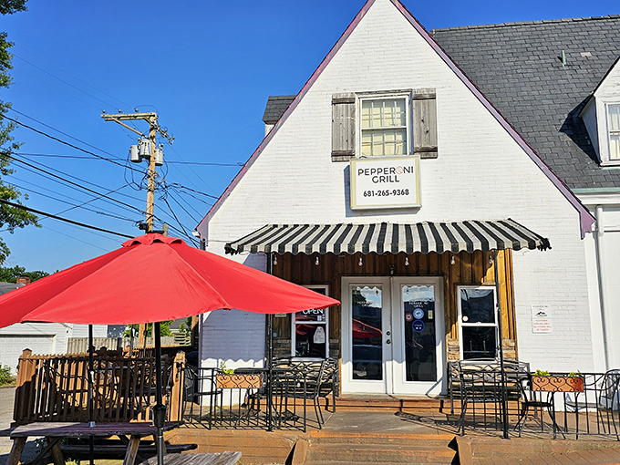 Pepperoni Grill's quaint white house facade hides a serious pizza operation inside.