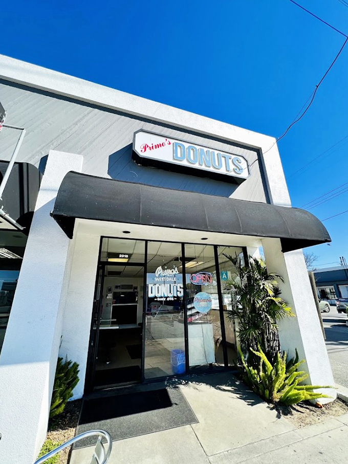 Primo's clean white exterior with its vintage signage isn't trying to impress anyone—until you taste what might be LA's most perfect buttermilk bar.