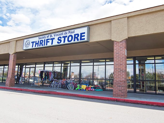When a storefront window displays bikes and toys, it's advertising childhood joy at grown-up discount prices.