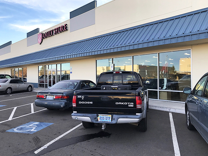 The Salvation Army's simple storefront hides a thrifter's paradise. That blue awning is like a secret handshake for bargain hunters.