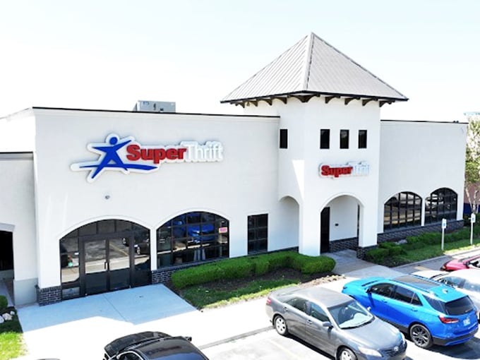 Super Thrift's distinctive white tower stands like a lighthouse, guiding bargain seekers safely to the shores of amazing deals.