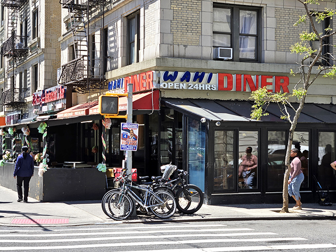 WaHi Diner's bold red and blue signage announces "OPEN 24HRS" &ndash; because breakfast cravings don't follow a clock.