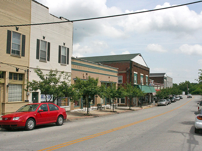 Wilmore's main street in spring: where cherry blossoms and brick buildings create a palette that would make Bob Ross weep with joy.