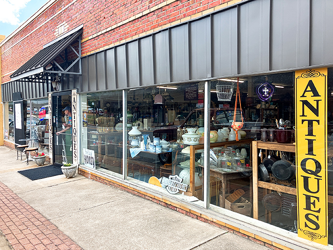 Winfield's bright blue awning pops against the brick backdrop. A no-nonsense exterior hiding extraordinary finds.