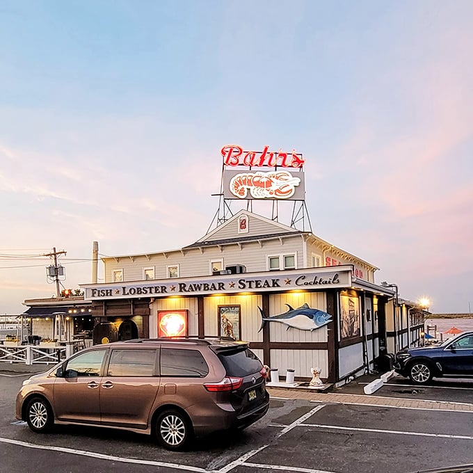 Bahrs Landing: The neon sign glows like a seafood lighthouse, guiding hungry travelers to lobster nirvana since grandpa's day.