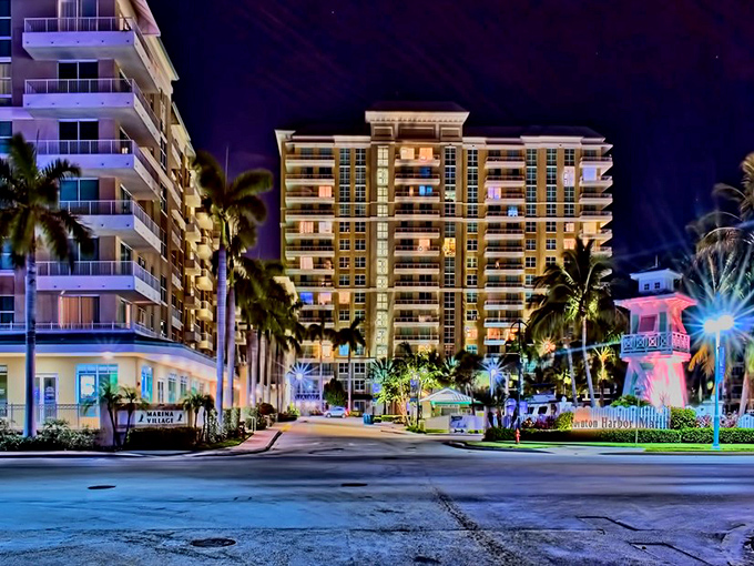 Boynton Beach's waterfront condos light up the night sky, offering coastal living without the "sell a kidney" price tags of nearby Palm Beach.