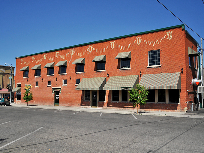 This well-preserved brick building in Burley's downtown district represents the charming historical character that gives the town its distinctive small-town appeal, perfect for leisurely afternoon strolls.