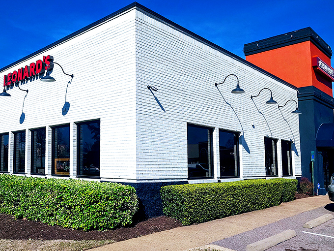White walls, red awning, and legendary status. Leonard's understated appearance lets the smoked meat do all the talking.