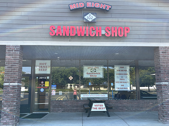 That unassuming strip mall facade hides sandwich greatness that proves you should never judge a deli by its exterior.