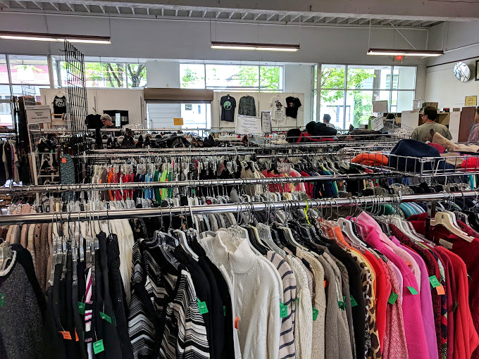 Racks of carefully organized clothing await new owners at William Temple House &ndash; where thrifting feels more like boutique shopping.