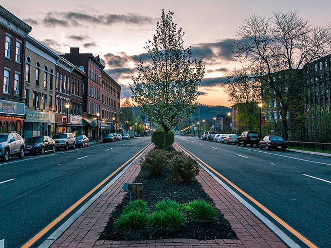Sunset casts a golden glow on Winsted's Main Street. Beautiful moments like this come free with your affordable rent.