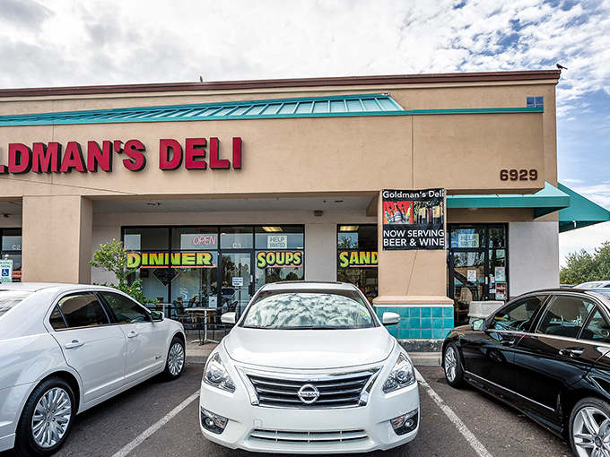 Welcome to sandwich paradise! Goldman's Deli stands proud, its neon sign a beacon for hungry souls seeking deli nirvana.