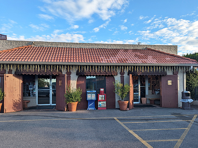 The red-roofed sanctuary of breakfast dreams stands proudly against Sedona's iconic red rocks, promising morning salvation for hungry travelers.