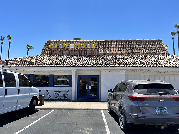 The humble exterior of Niro's Gyros stands like a Mediterranean mirage in the Phoenix desert, complete with classic tile roof and swaying palm trees.