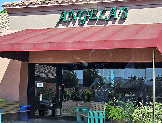 Angela's Kitchen welcomes you with its warm terracotta exterior and vibrant red awning&mdash;like a sunset-colored beacon for hungry souls in Surprise.