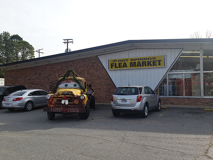Mater's long-lost Arkansas cousin greets visitors outside the Hot Springs Flea Market, proving that even tow trucks deserve a second act in showbiz.