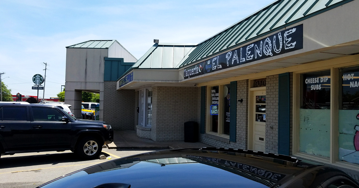 The unassuming exterior of El Palenque proves once again that culinary treasures often hide behind the most modest facades. Teal shutters and all.