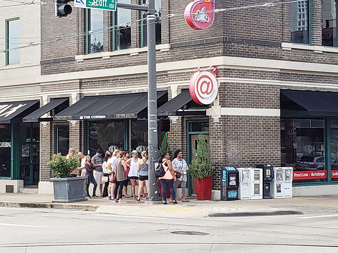 The iconic @ symbol beckons from this brick corner spot in downtown Little Rock, promising modern diner delights with a side of urban charm.
