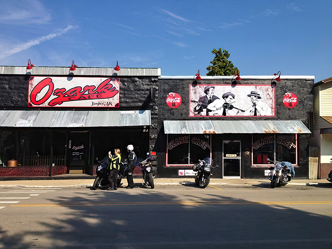 The classic facade of Ozark Cafe stands proudly on Jasper's main street, its vintage signage and Coca-Cola murals promising a time-traveling culinary adventure.