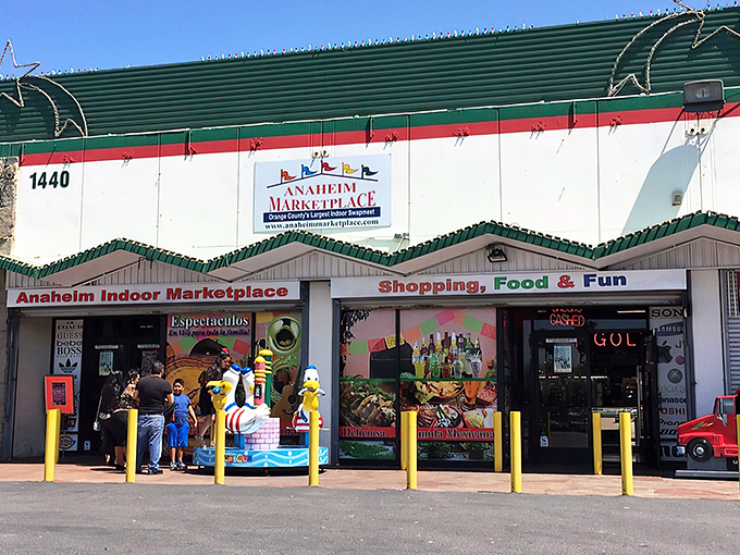 The unassuming exterior belies the treasure trove within. Like finding a secret portal to another world, this entrance promises adventure beyond the parking lot.