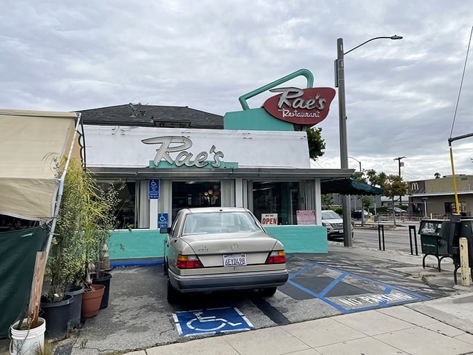 The turquoise-trimmed time capsule beckons with its vintage neon sign &ndash; a beacon of breakfast hope on Pico Boulevard where pancake dreams come true.