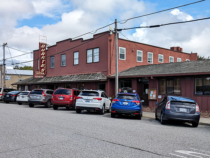 The iconic terracotta-colored exterior of Duarte's Tavern stands like a culinary lighthouse on Pescadero's main street, beckoning hungry travelers with its vintage neon sign.