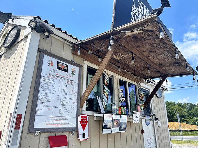 The humble chariot of smoke and glory. Smoke's Smokehouse trailer sits unassumingly in Newark, promising barbecue treasures that far exceed its modest appearance.