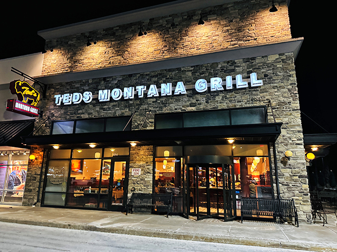 Ted's Montana Grill stands like a Western outpost in Newark, its stone facade and warm glow promising carnivorous delights within. The bison logo isn't just decoration&mdash;it's a promise.