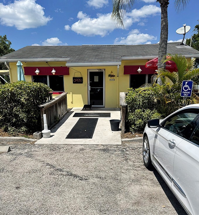The cheerful yellow exterior with pink awnings isn't just inviting&mdash;it's practically shouting "breakfast is served!" Palm trees and a wooden deck complete this slice of Florida comfort.