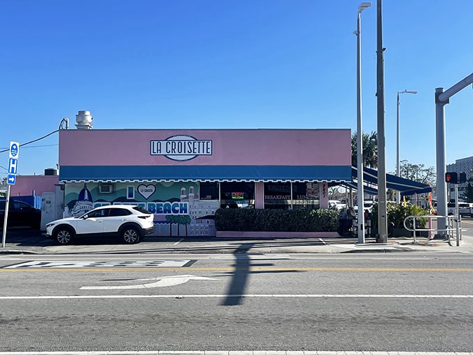 La Croisette's cheerful pink exterior with blue awnings stands out like a French postcard come to life on St. Pete Beach.