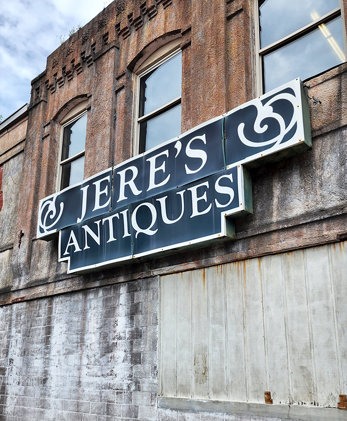 The unassuming castle of wood and wonder. Jere's Antiques' exterior gives little hint of the mahogany motherlode waiting just beyond those doors.
