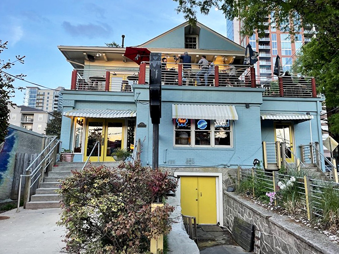 The little blue building that could. Nestled among Atlanta's skyscrapers, Steamhouse Lounge's charming exterior promises seafood treasures within those modest walls.