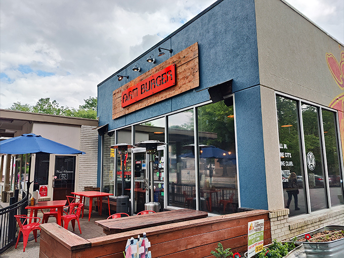 The blue facade with that rustic wooden sign is like a beacon for burger lovers. Farm-to-table isn&rsquo;t just a buzzword here&mdash;it&rsquo;s a delicious promise.