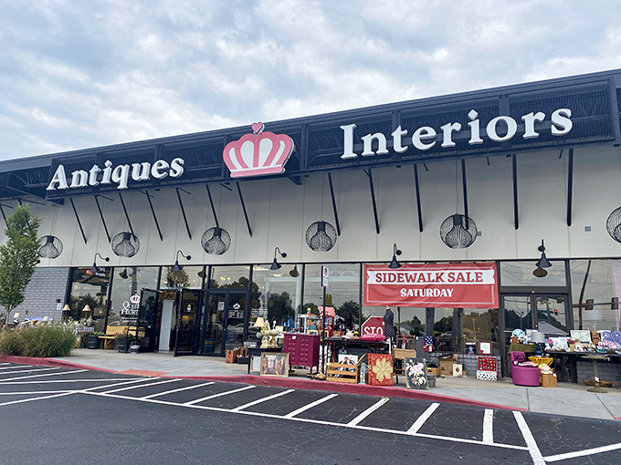 The royal welcome! Queen of Hearts Antiques & Interiors stands proudly in Marietta, its crown logo promising treasure hunters a kingdom of vintage delights inside.