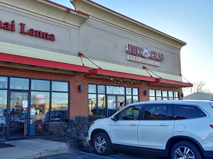 The unassuming storefront of Ugly Crab boldly announces its seafood mission – where flavor trumps vanity and Hoosiers find coastal treasures.