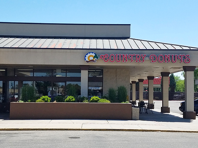 The unassuming storefront promises nothing fancy&mdash;just the sacred covenant of exceptional donuts waiting inside. Simple, straightforward, perfect.