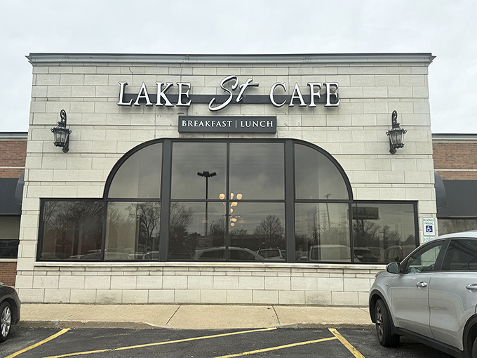 An unassuming strip mall storefront that proves culinary treasures don't always hide in fancy buildings. The American flag stands guard over breakfast paradise.