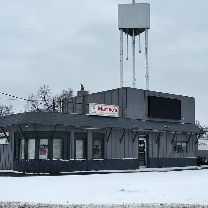 The unassuming exterior of Marino's, with its turquoise door and boot-shaped Italian sign, proves that culinary treasures often hide in the most modest packages. 